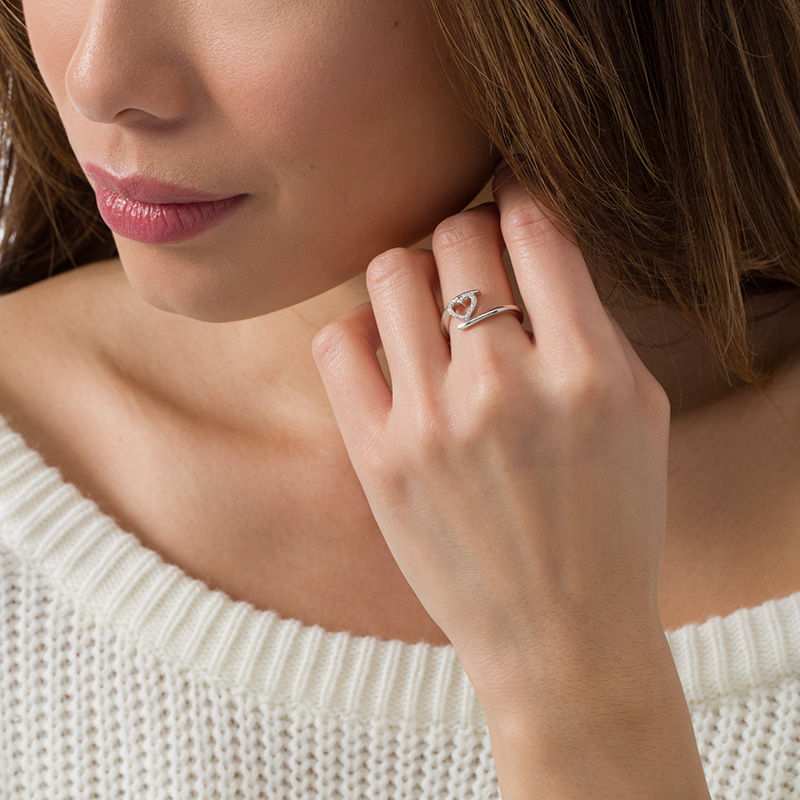 1/15 CT. T.W. Diamond Heart Outline Bypass Ring in Sterling Silver ...