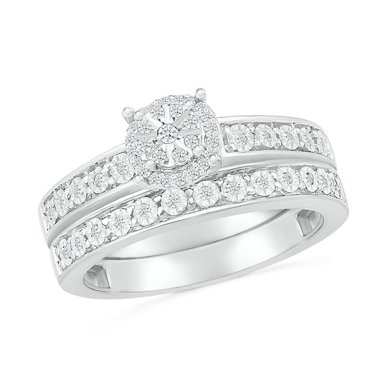 1/6 CT. T.W. Multi-Diamond Frame Channel Bridal Set in Sterling Silver ...